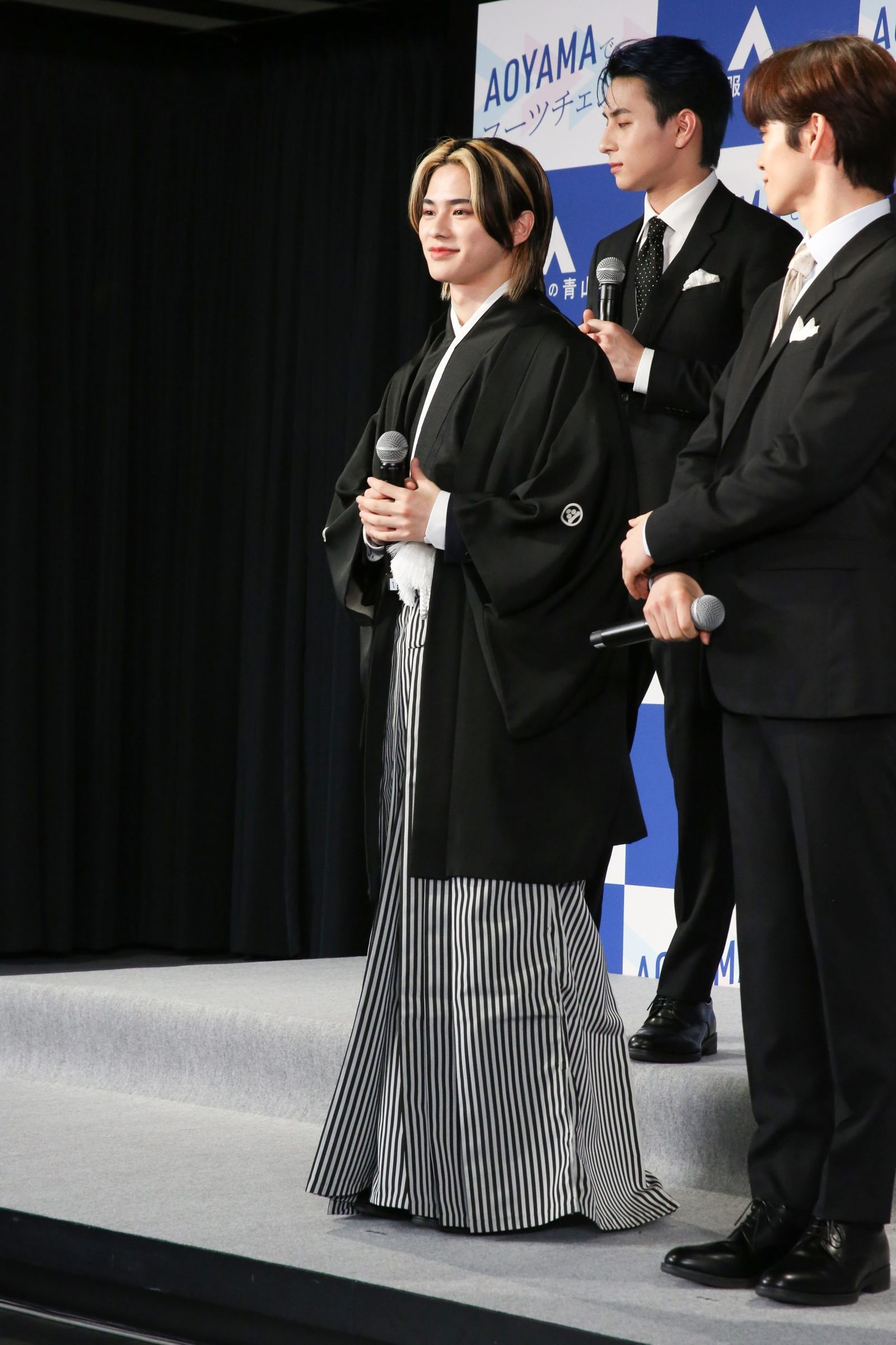 「洋服の青山」新CMにINIを起用 CMではスーツ姿で激しいダンスを披露 - WWDJAPAN